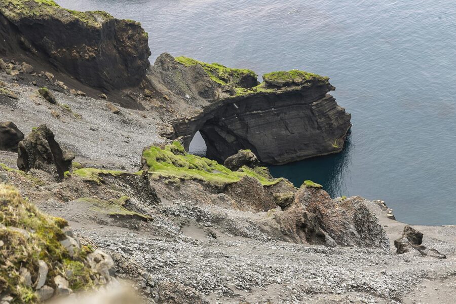 Black sand beach with powerful Atlantic waves crashing ashore