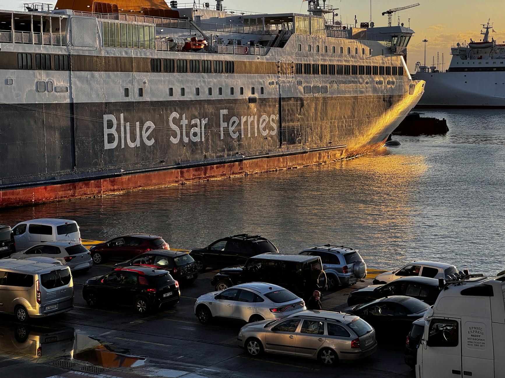 Ferry docked at Athens Piraeus port at sunset
