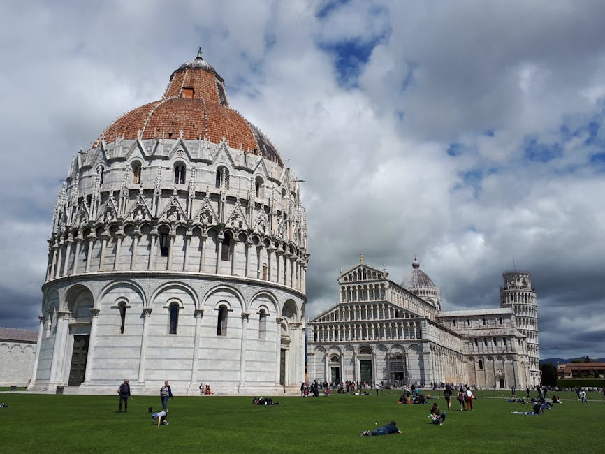 Pisa Cathedral and Tower under dramatic sky