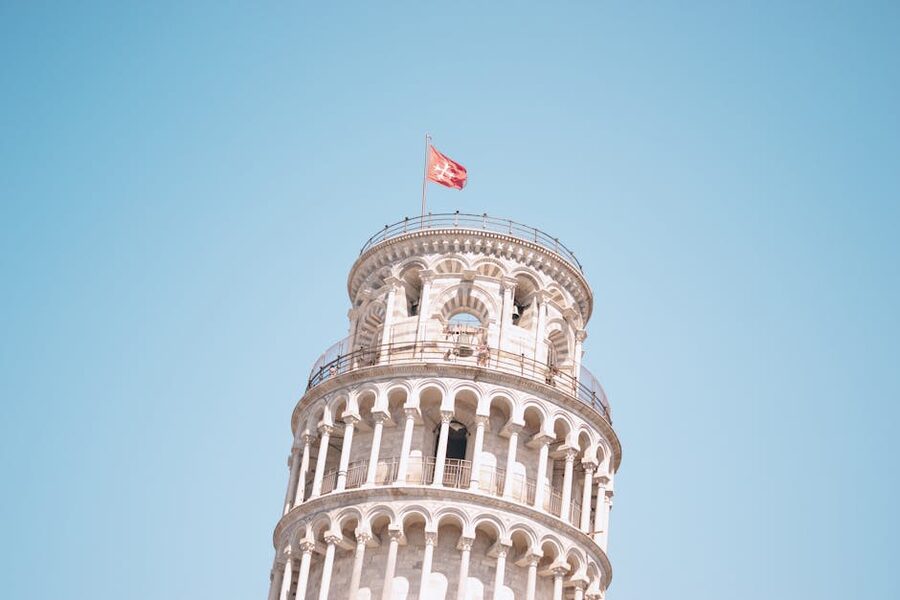 Close-up of the Pisa Leaning Tower under blue sky