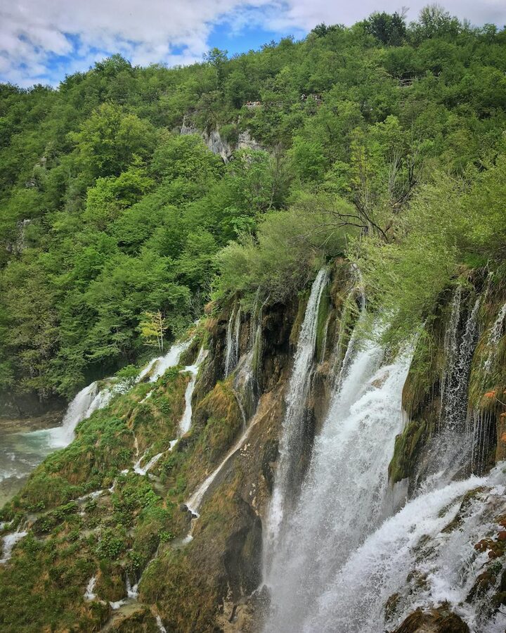 Waterfalls among trees in Plitvice Lakes Croatia