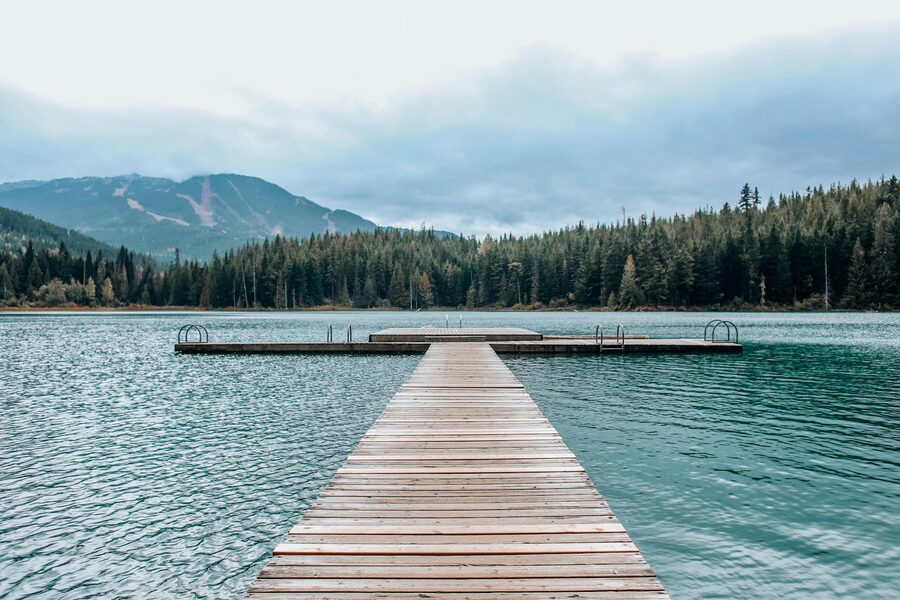 Wooden dock on turquoise lake