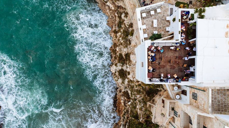 Seaside dining in Polignano aerial view