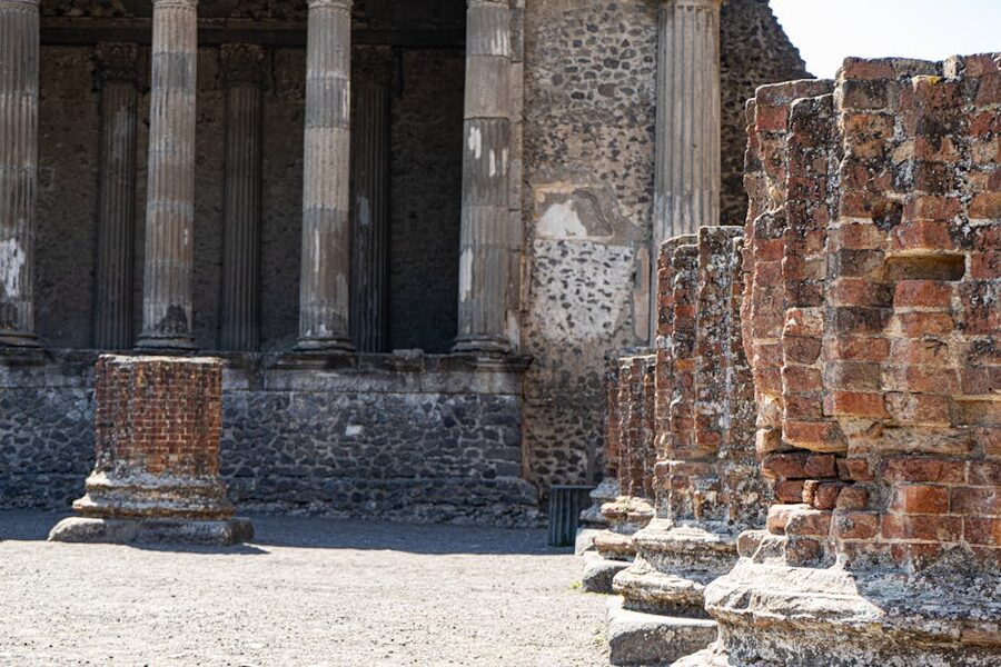 Sunlit ancient columns in Pompeii ruins