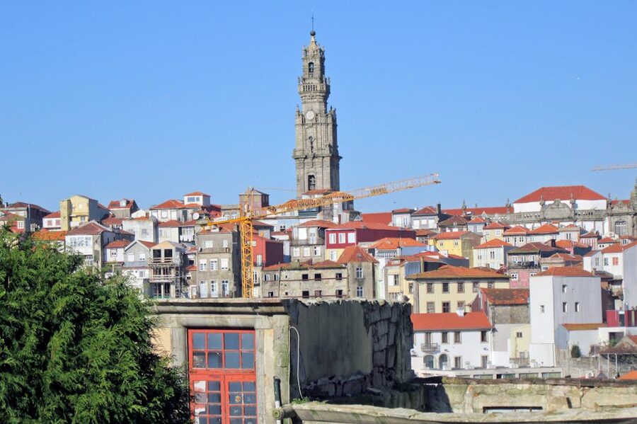 Clerigos Tower surrounded by colorful Porto buildings