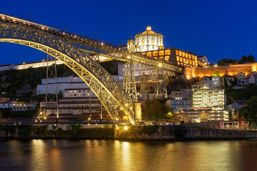 Illuminated Dom Luis I Bridge and Serra do Pilar Monastery in Porto at night