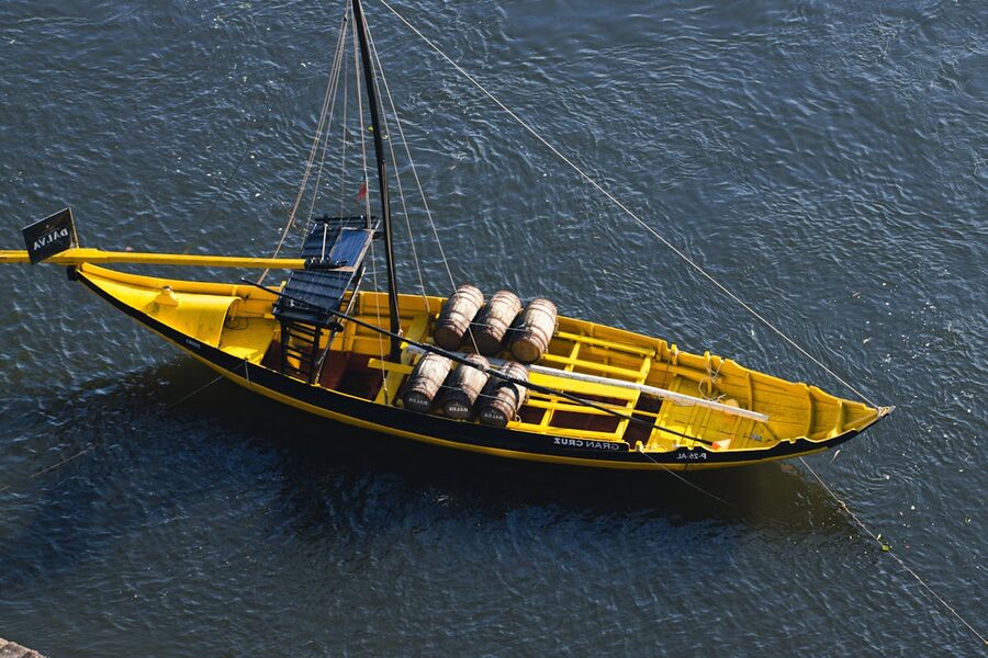 Yellow rabelo boat moored on the Douro River in Porto