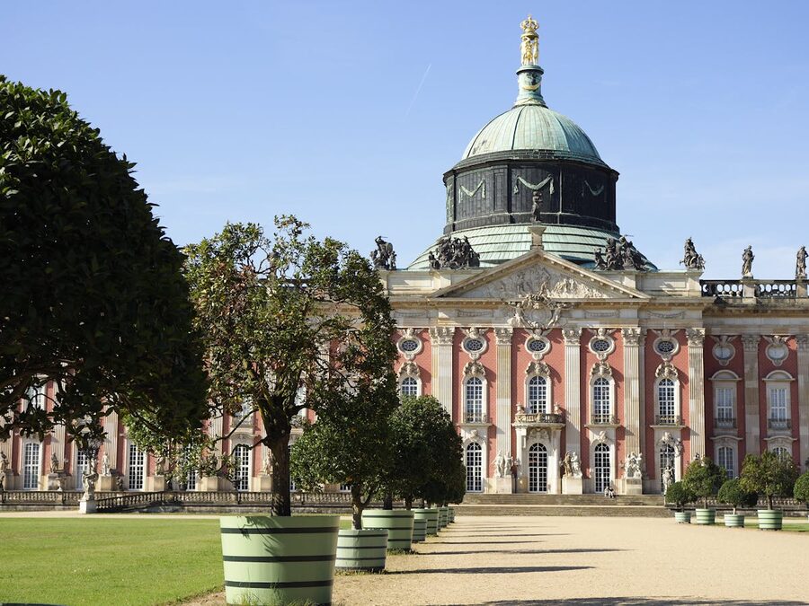 Wide view of palace and formal gardens in Sanssouci Park Potsdam