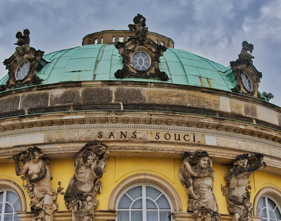 Architectural details of Sanssouci Palace showing classical columns and relief work