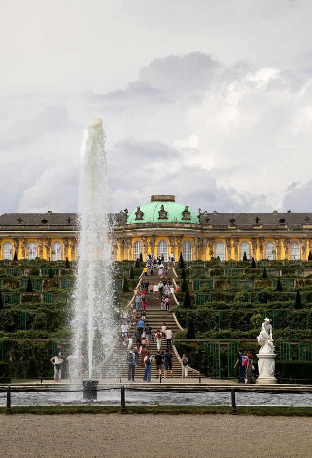 Great Fountain at the base of Sanssouci terraces with palace visible above