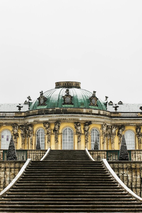 Sanssouci Palace covered in winter snow in Potsdam