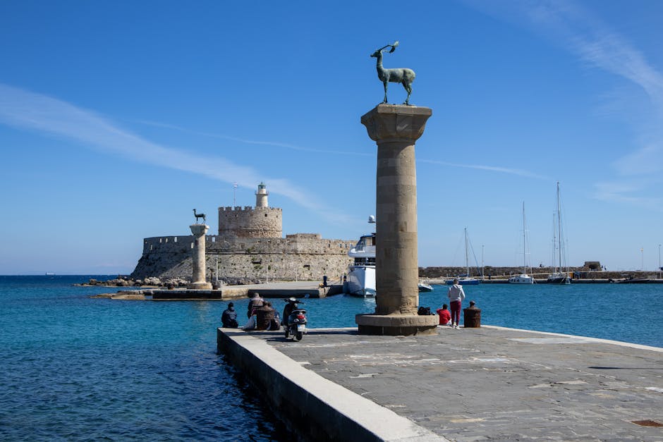 Rhodes Mandraki marina where traditional tour boats depart for Symi
