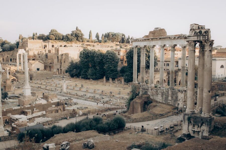 Roman Forum ancient ruins under blue sky in Rome