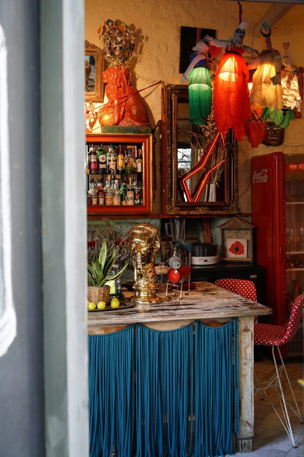 Eclectic bar interior with bright decor