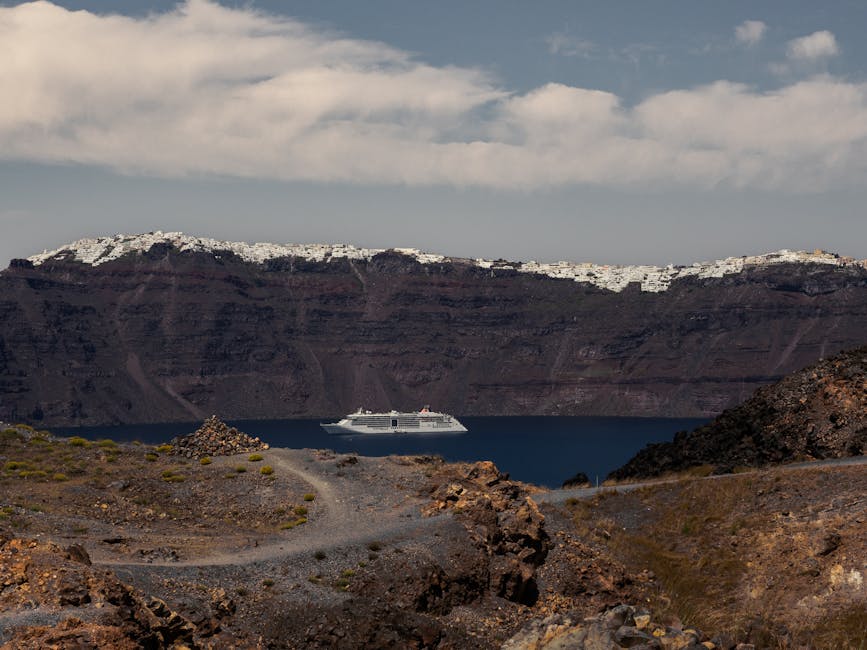 Santorini Oia village at sunset seen from the caldera