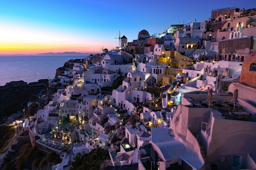 Sunset over Thira houses on Santorini