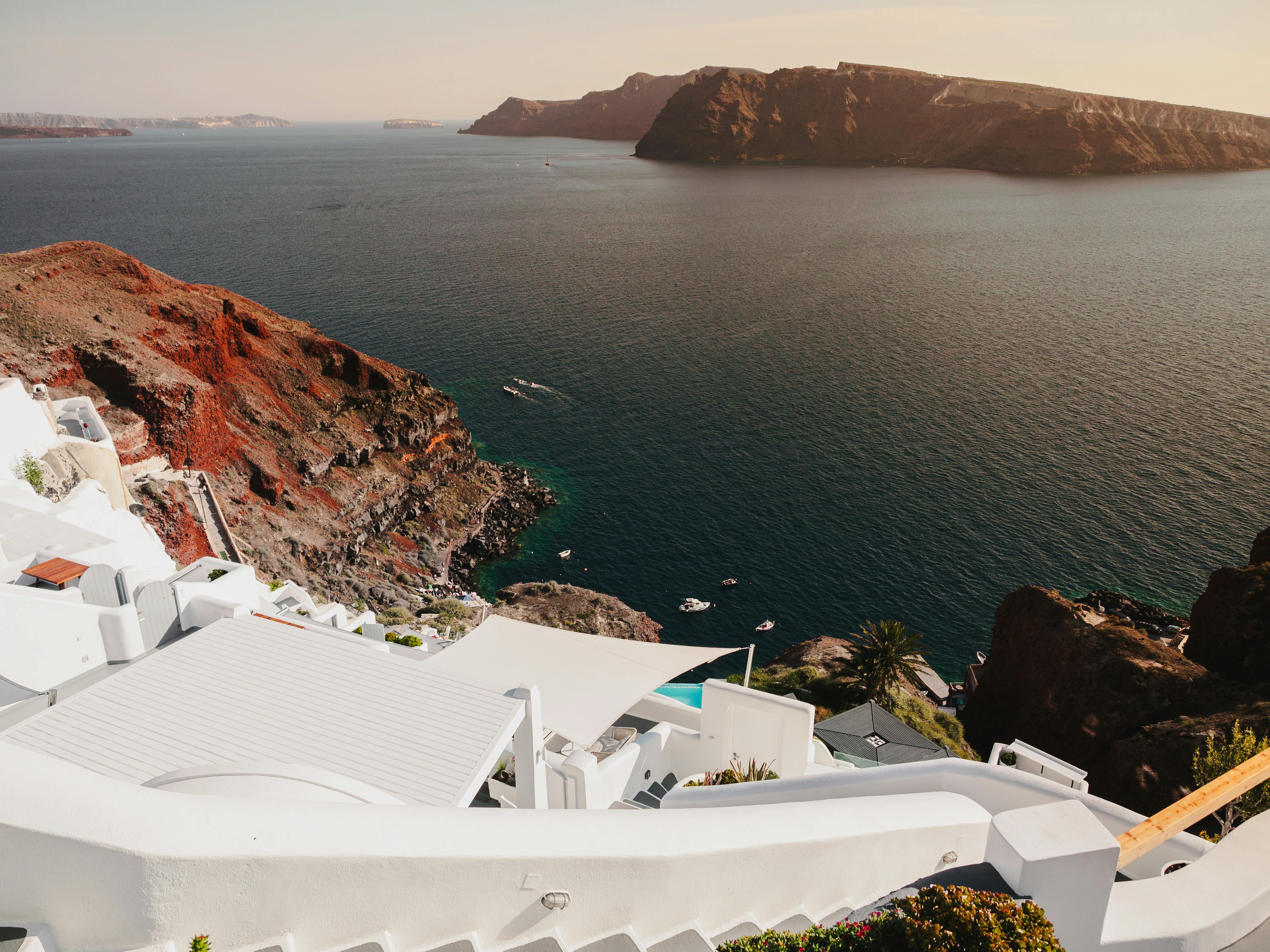 White walls of a Santorini clifftop town