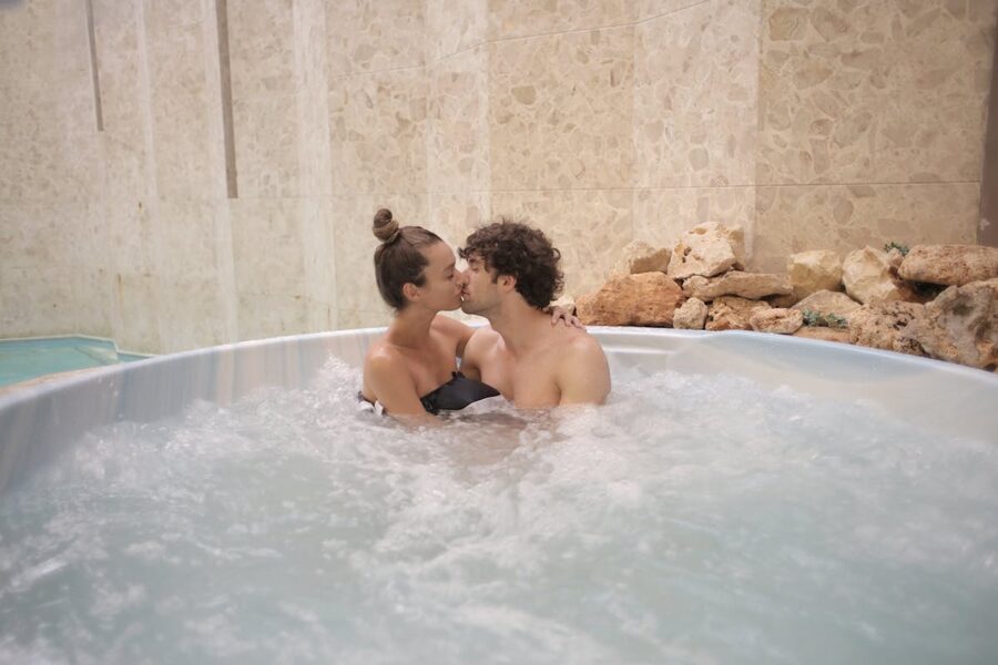 Couple in indoor hot tub