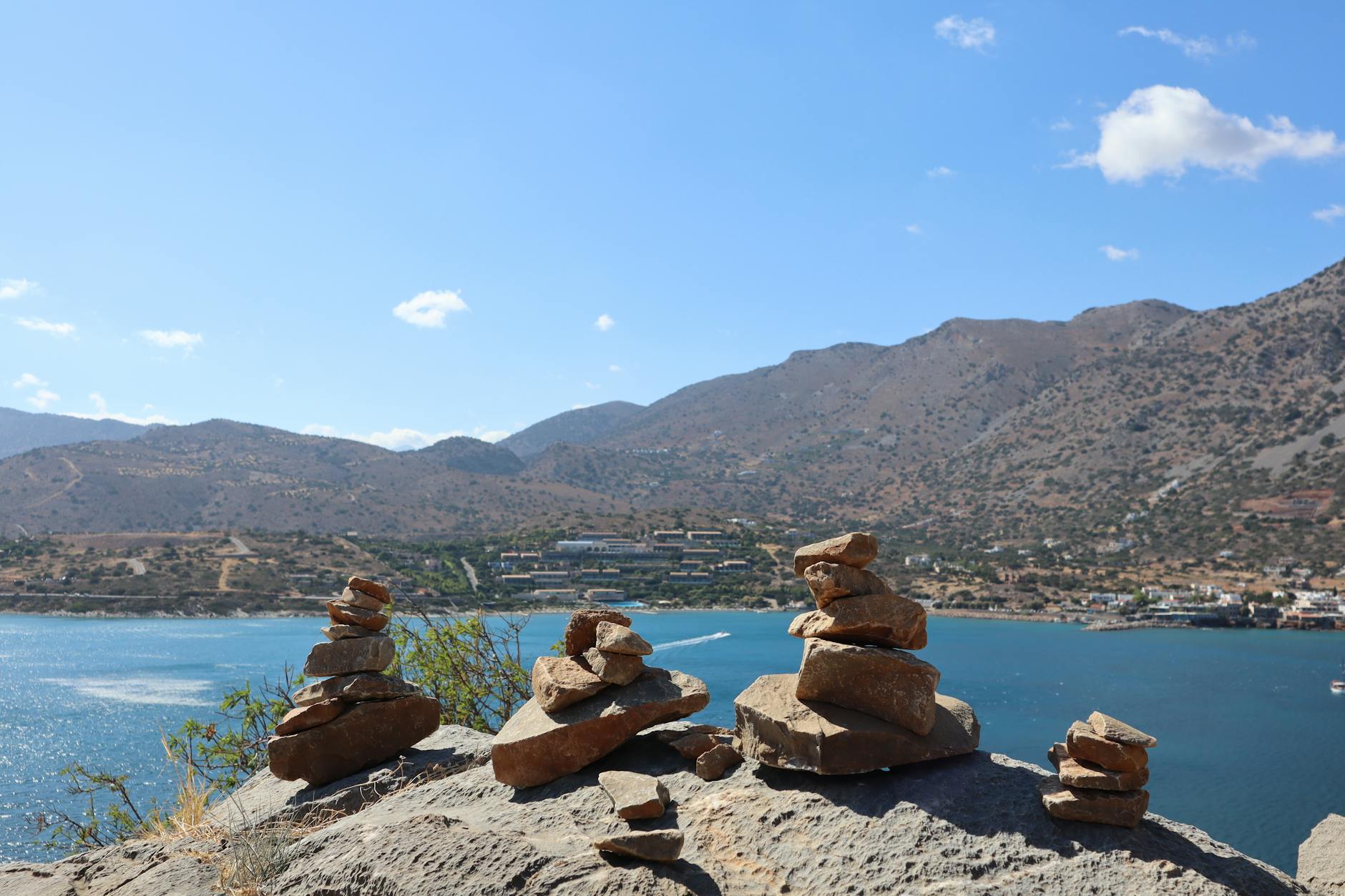 Stone cairns on a hill overlooking Elounda bay