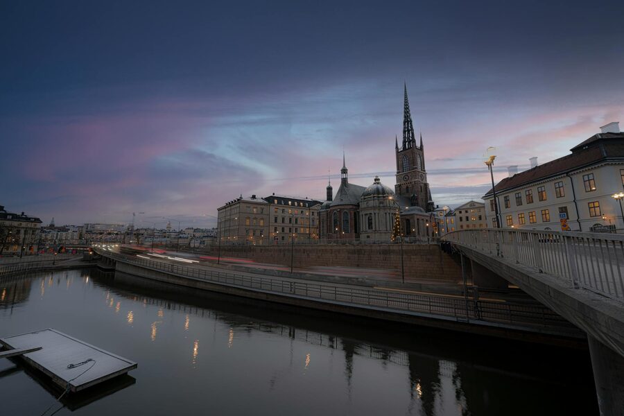 Riddarholmen Church and waterfront at twilight in Stockholm