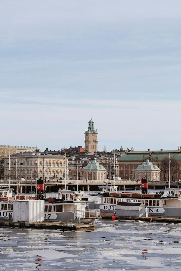 Stockholm waterfront with boats and historic buildings in winter