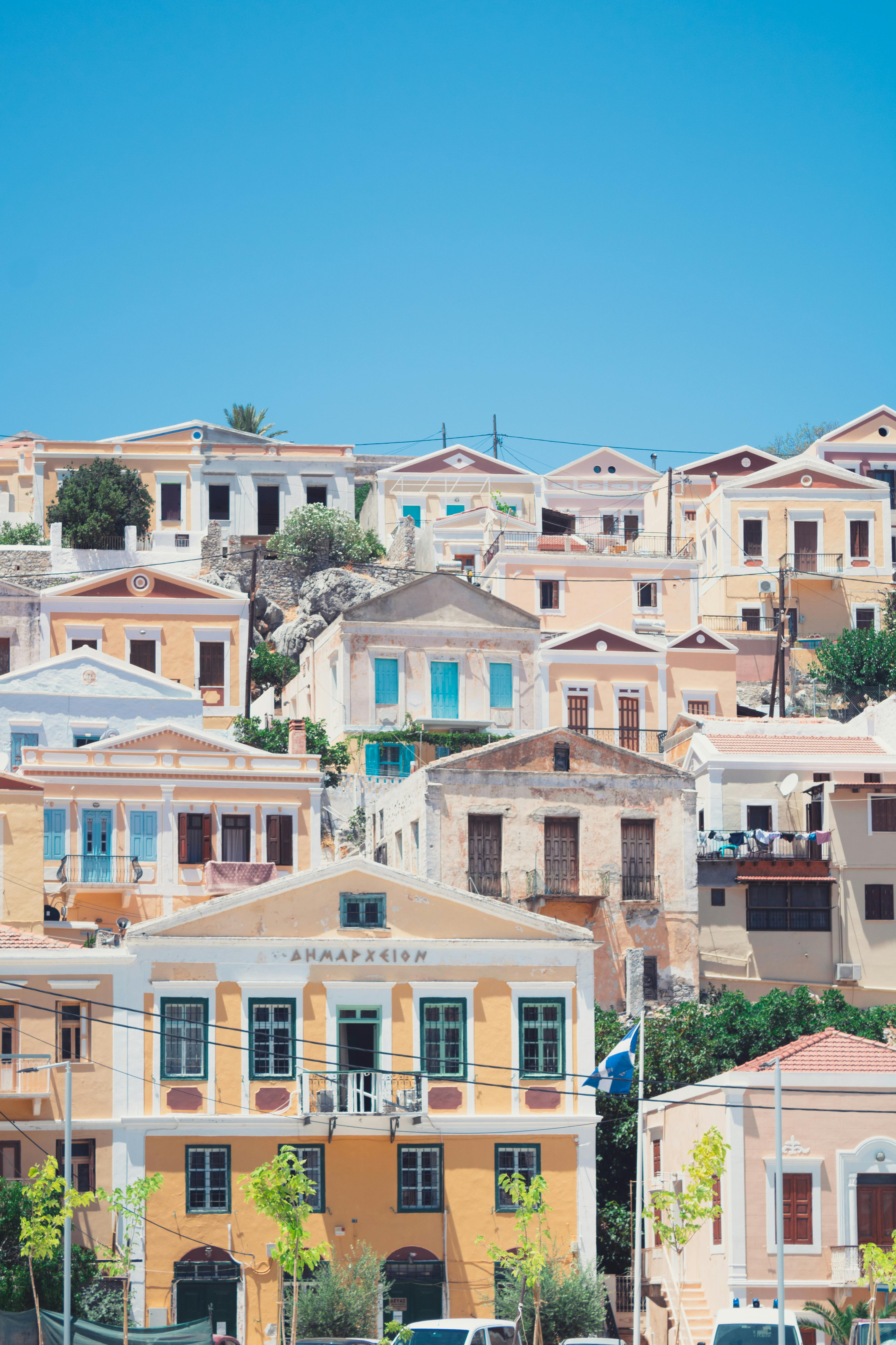 Traditional Symi houses against blue sky