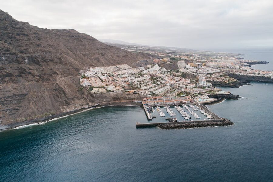 Aerial view of Los Gigantes marina and cliffside Tenerife