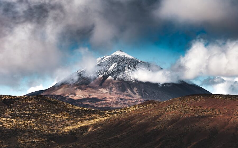 Mount Teide snow-capped with drifting clouds