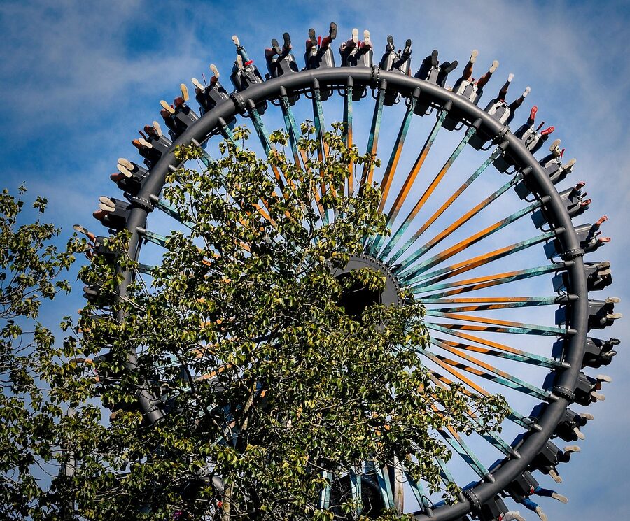 Carousel ride in green park setting at Tivoli Gardens
