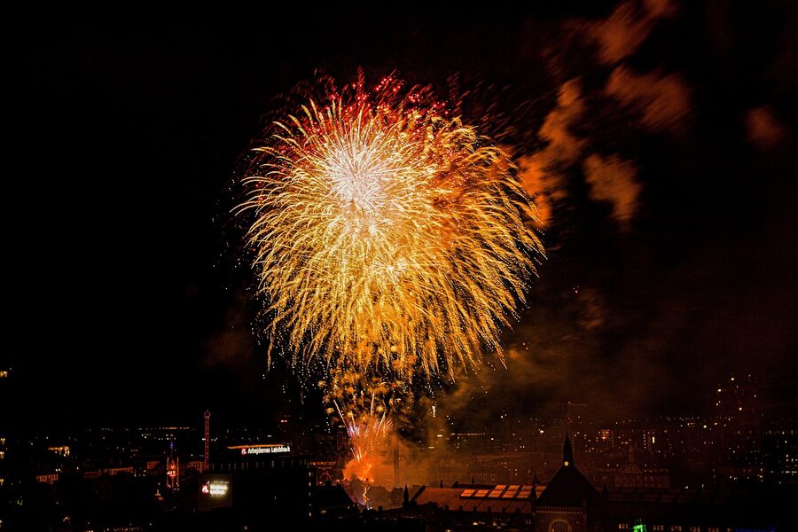 Fireworks display over Tivoli Gardens at night in Copenhagen