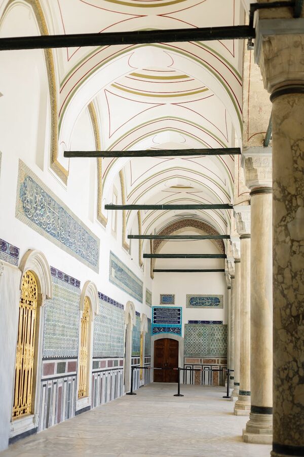 Ornate arches and decorative Iznik tiles inside Topkapi Palace museum