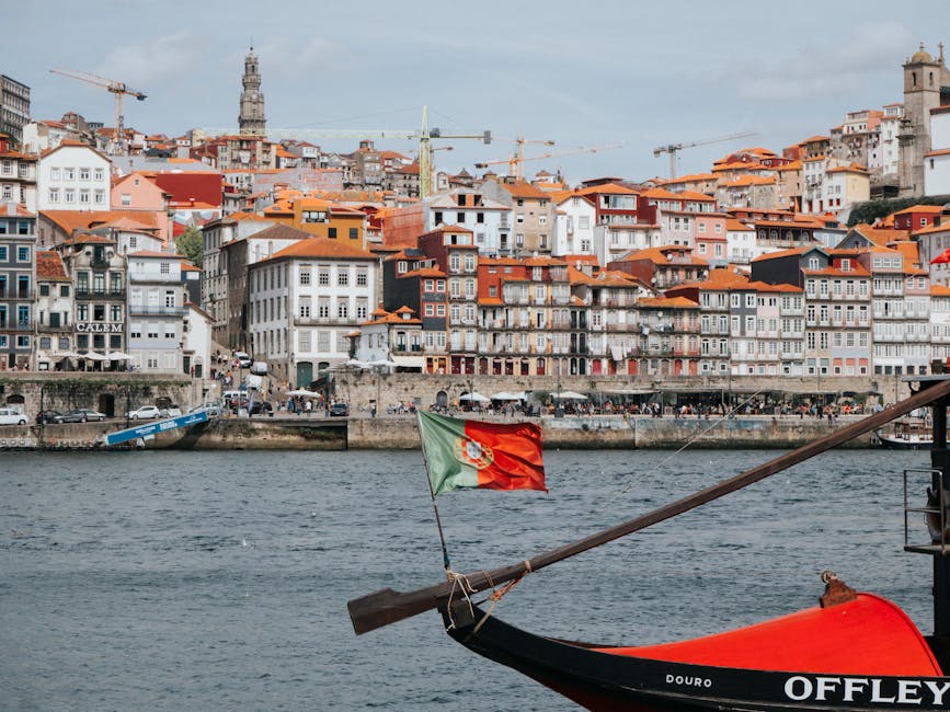 Colorful Ribeira district Porto with Douro River and boats
