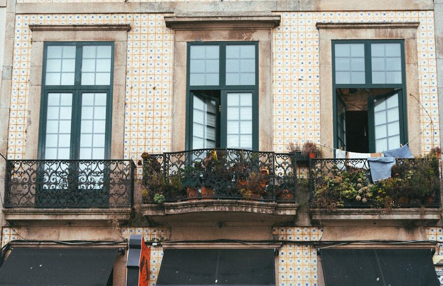 Porto iron balcony and tile facade detail