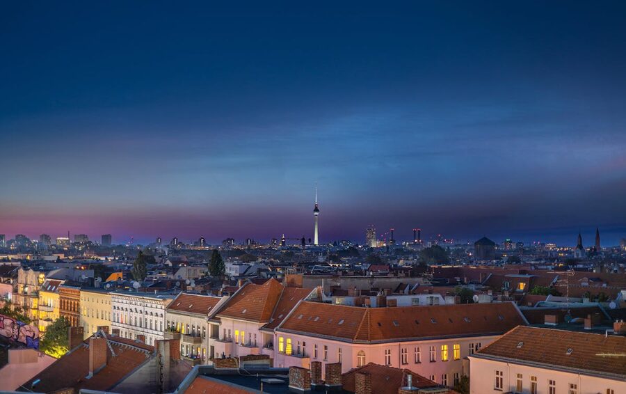 Wide view of Berlin skyline featuring the TV Tower during twilight