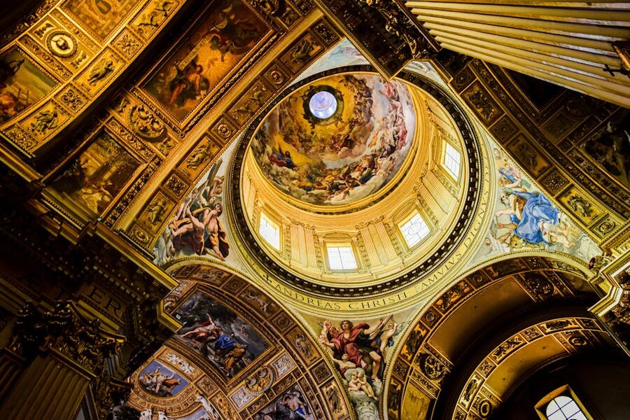 Interior of St Peters Basilica dome with Renaissance frescoes