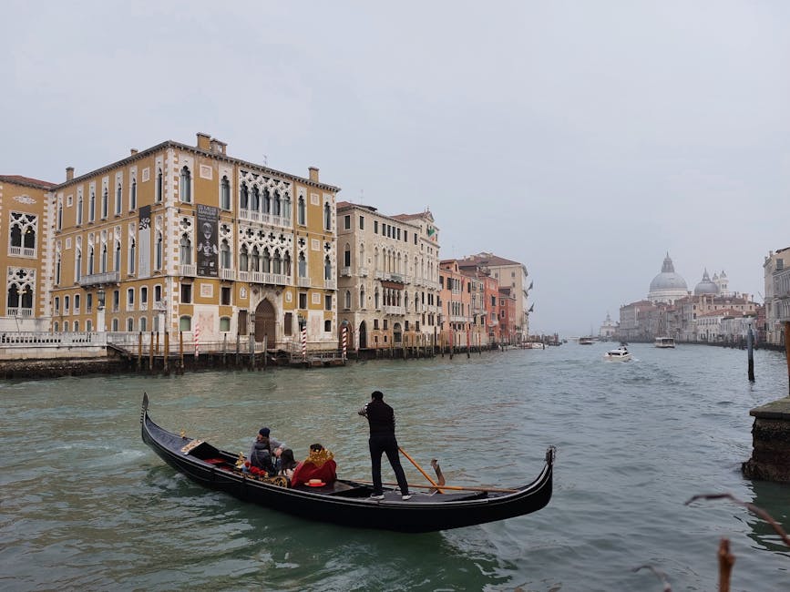 Gondola on Grand Canal with Venetian architecture