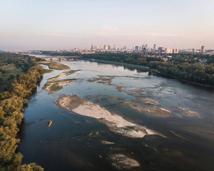 Aerial view of Vistula River through Warsaw at sunset
