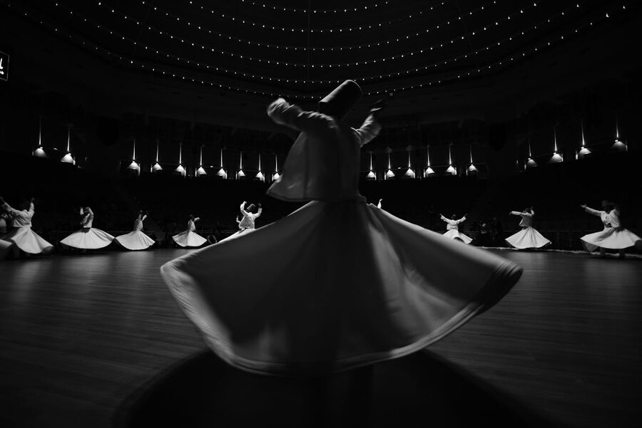 Whirling dervishes in Konya black and white