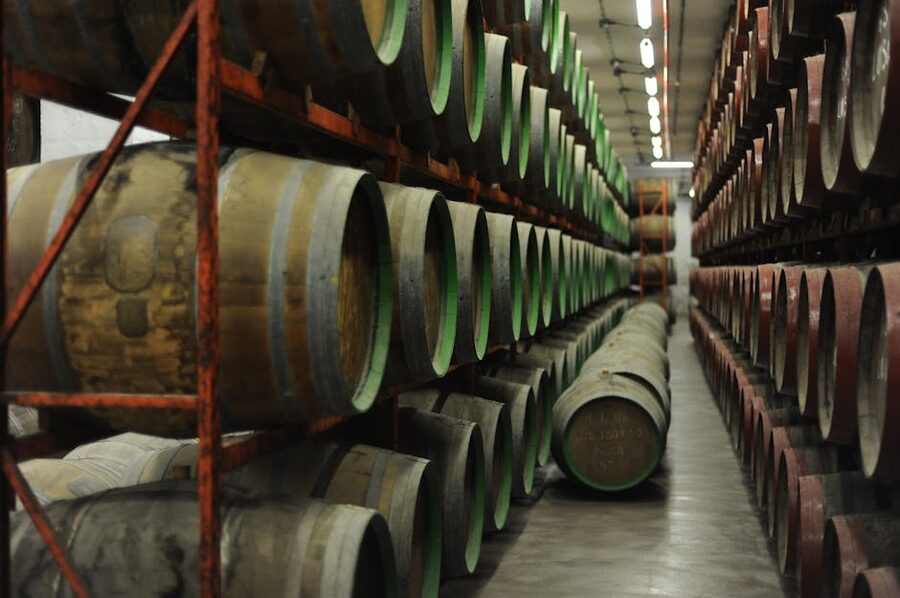 Rows of wine barrels aging wooden