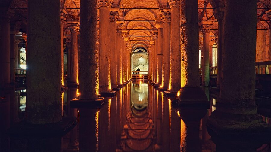 Underground view of the Yerebatan Cistern with perfect column reflections in the water