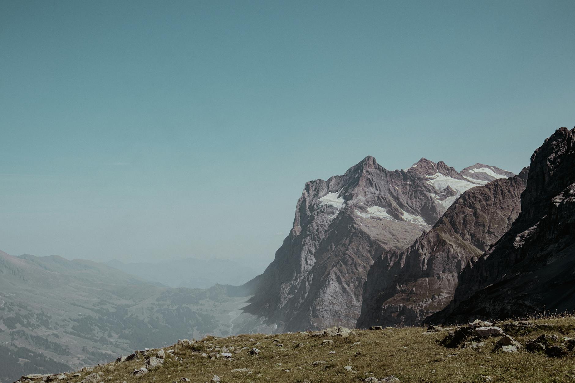 Grindelwald village with clear skies and mountain peaks behind