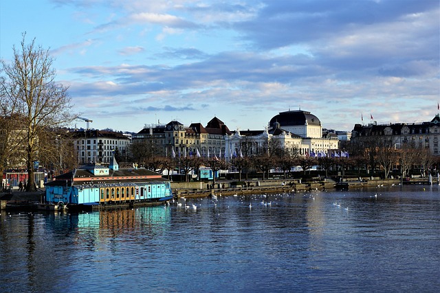 Zurich Limmat river with opera house and Grossmünster