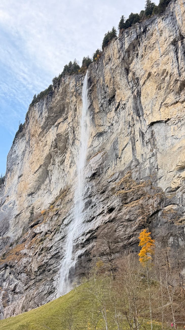 Staubbach Falls cascading down a cliff face in Lauterbrunnen